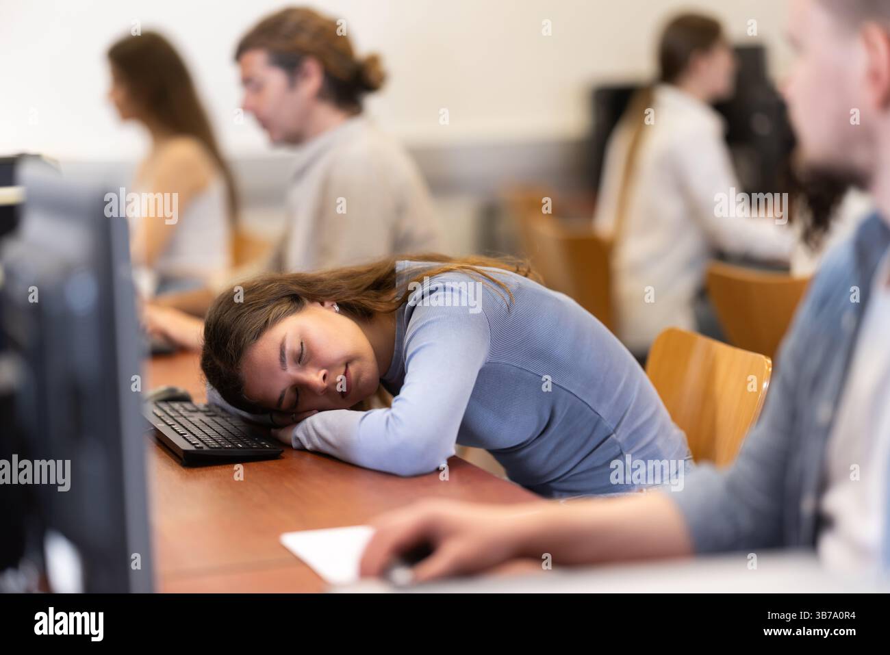 Woman fell asleep table hi-res stock photography and images - Alamy