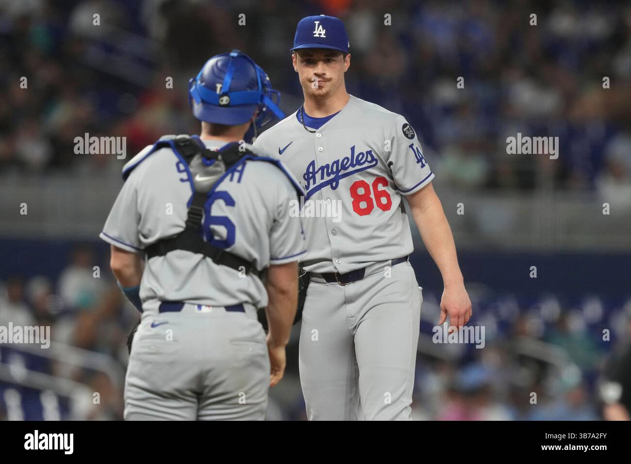 Los Angeles Dodgers pitcher Jack Dreyer (86) talk to catcher catcher ...