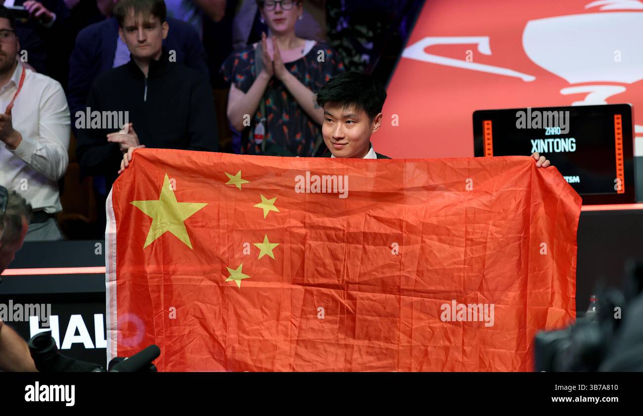 Sheffield, Britain. 5th May, 2025. Zhao Xintong of China celebrates ...