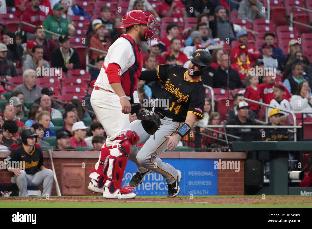 Pittsburgh Pirates' Joey Bart (14) scores past St. Louis Cardinals ...