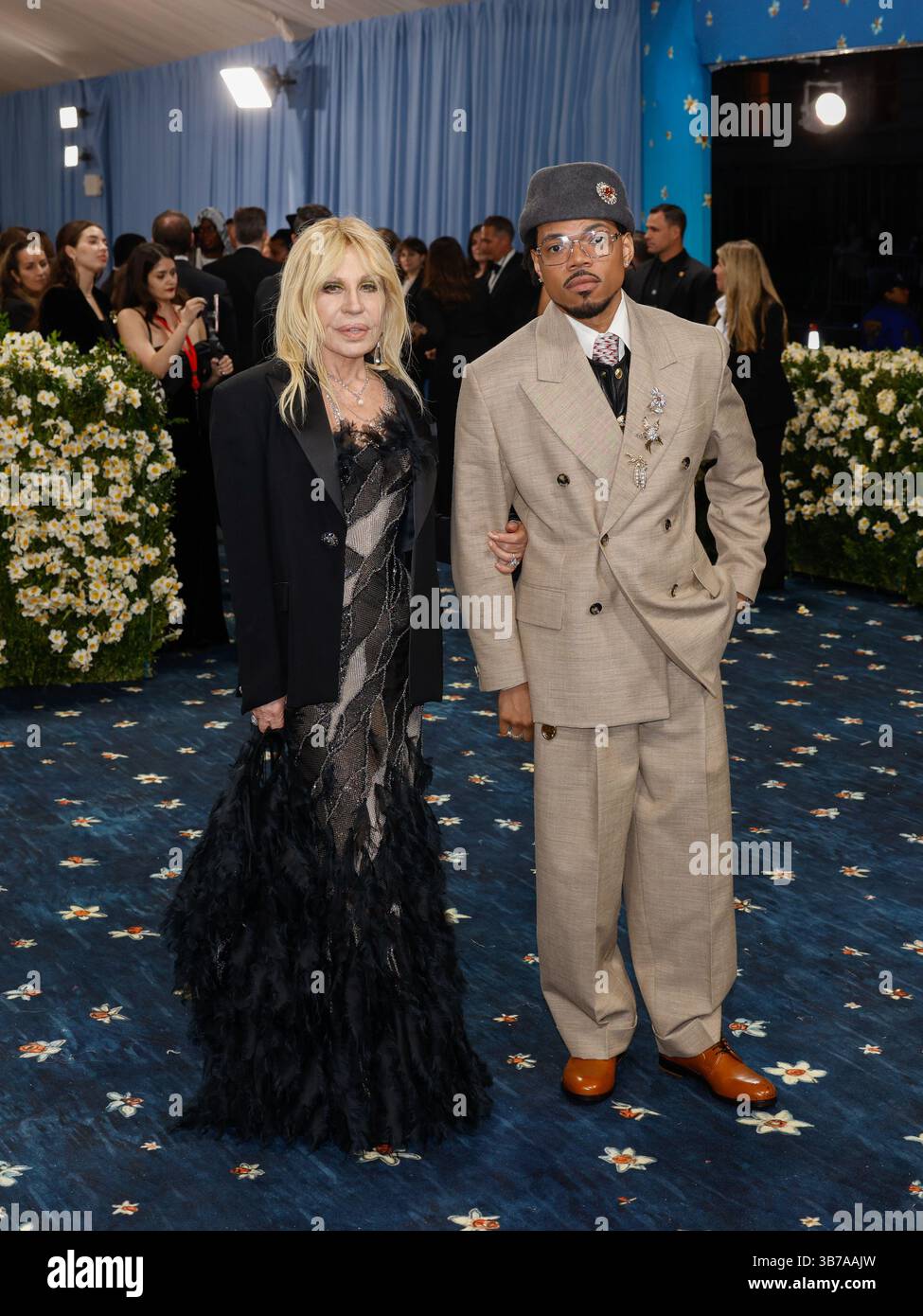 Chance the Rapper and Donatella Versace arrive on the red carpet at the ...