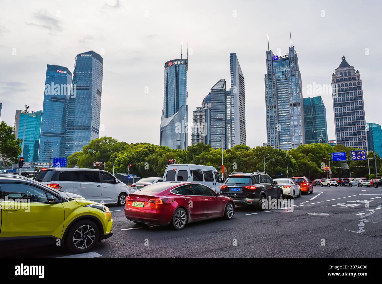 Shanghai, China – 1 April 2025: Traffic at busy intersection in Pudong ...