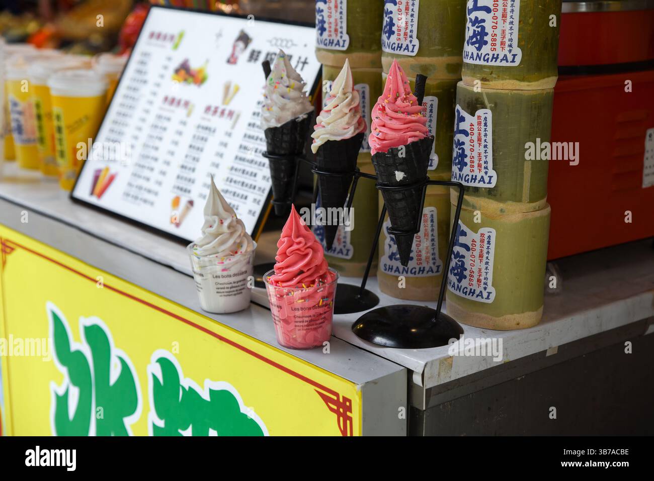 Shanghai, China - 1 April 2025: Colorful soft serve ice cream in black ...