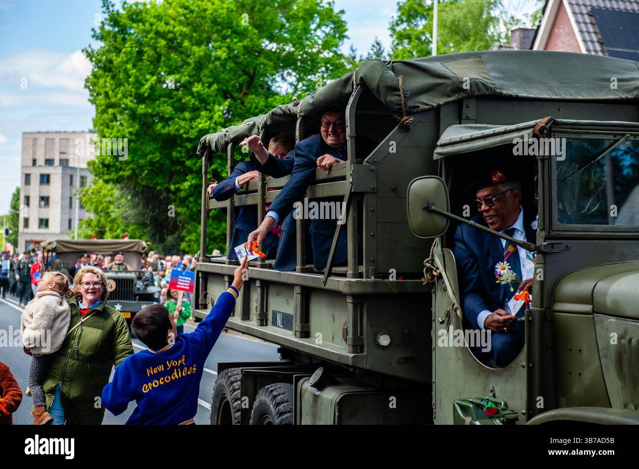 People seen greeting and shaking hands with the veterans. The ...