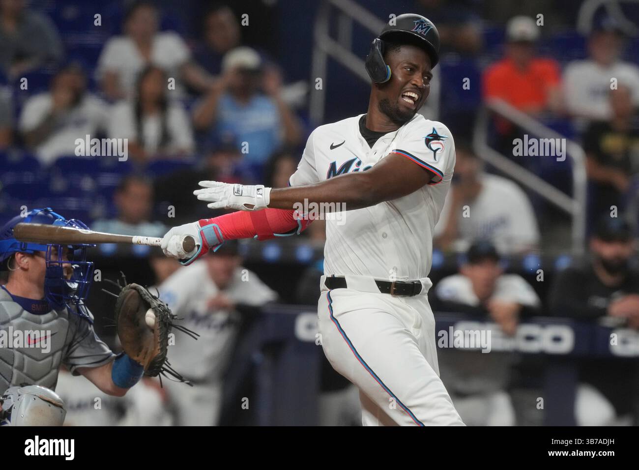 Miami Marlins' Jesús Sánchez (7) swings for a strike during the ninth ...