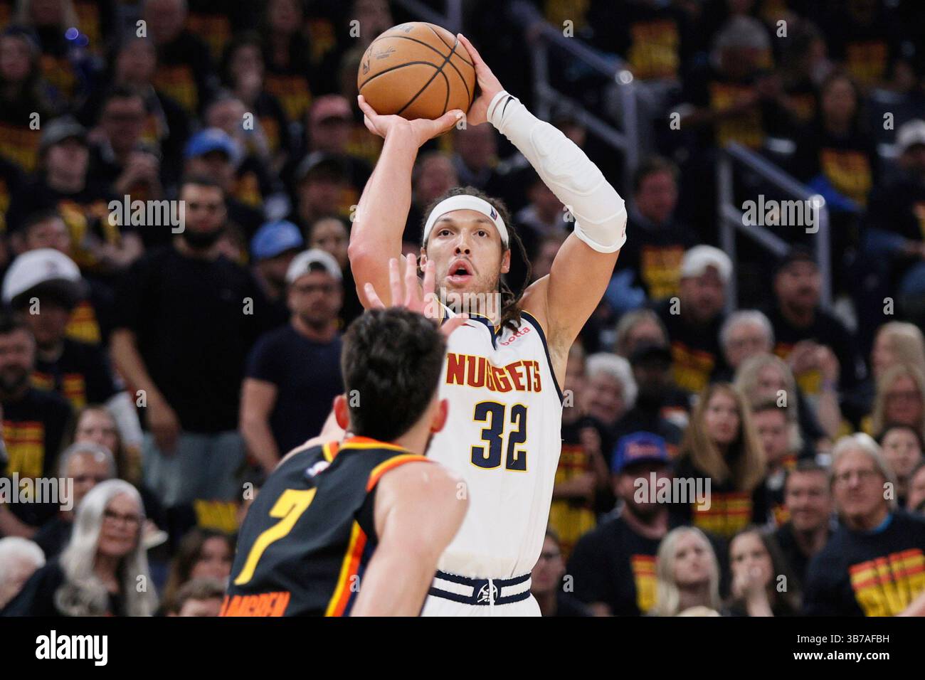 Denver Nuggets forward Aaron Gordon (32) shoots as Oklahoma City Thunder's Chet Holmgren (7 ...