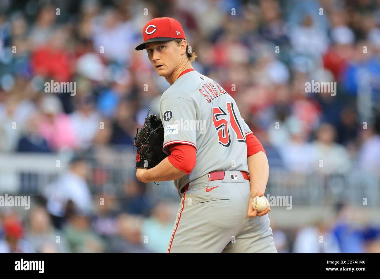 ATLANTA, GA - MAY 05: Brady Singer #51 of the Cincinnati Reds looks ...