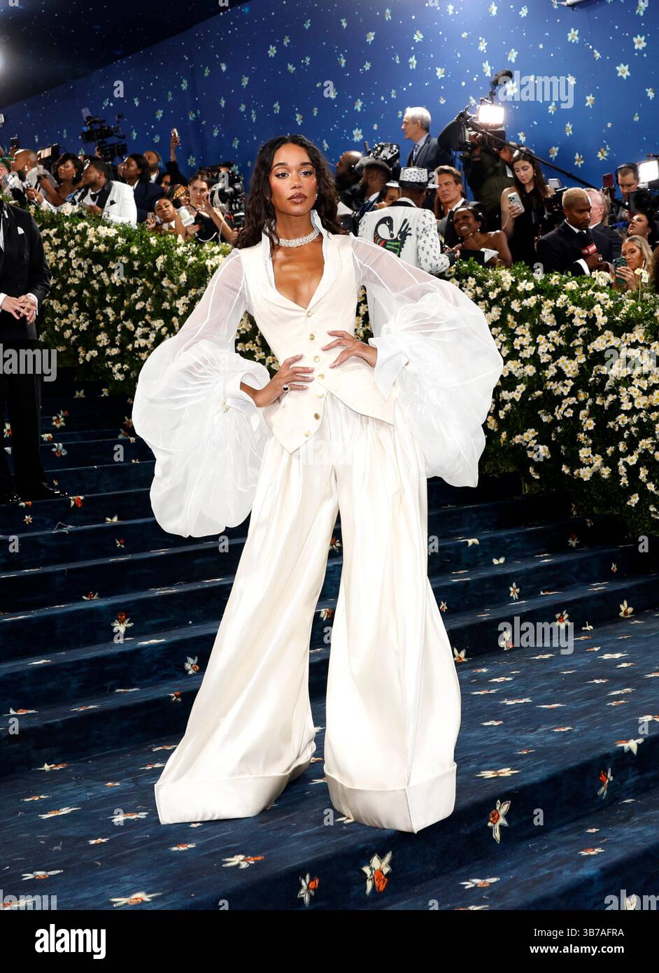 Laura Harrier arrives on the red carpet at the 2025 Met Gala ...