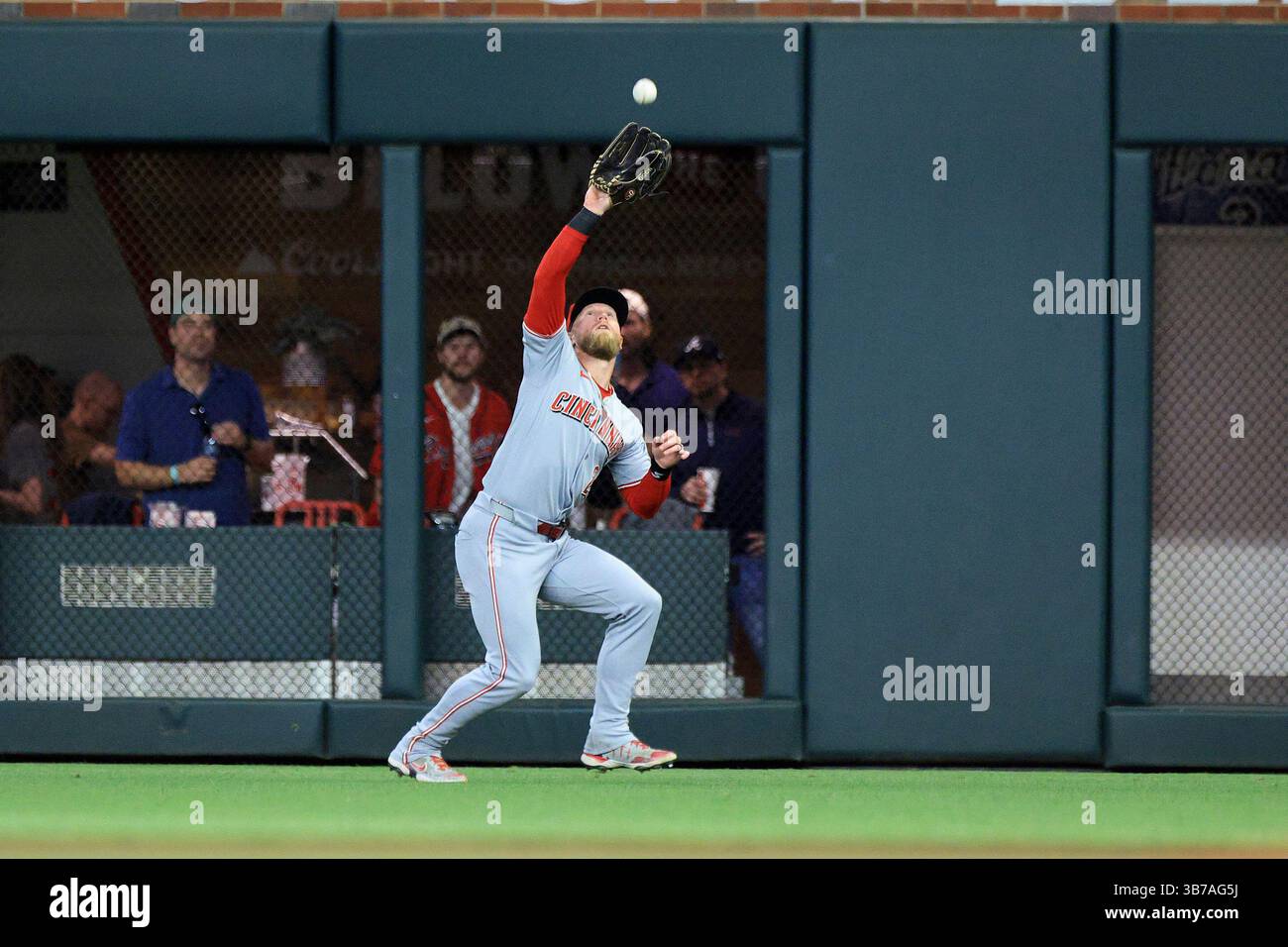ATLANTA, GA - MAY 05: Jake Fraley #27 of the Cincinnati Reds makes a ...