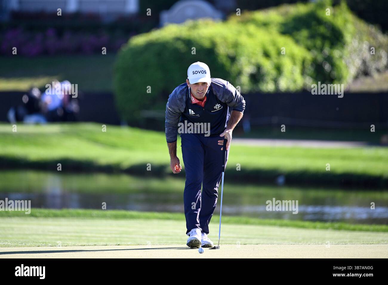 Denny McCarthy lines up his putt on the 17th green during the first ...