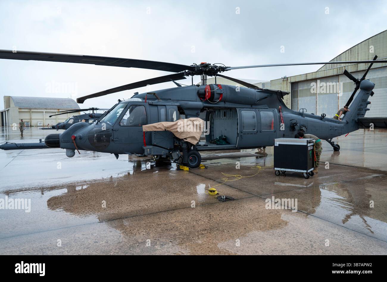 A U.S. Air Force HH-60W Jolly Green II is maintained by the 33rd Rescue ...
