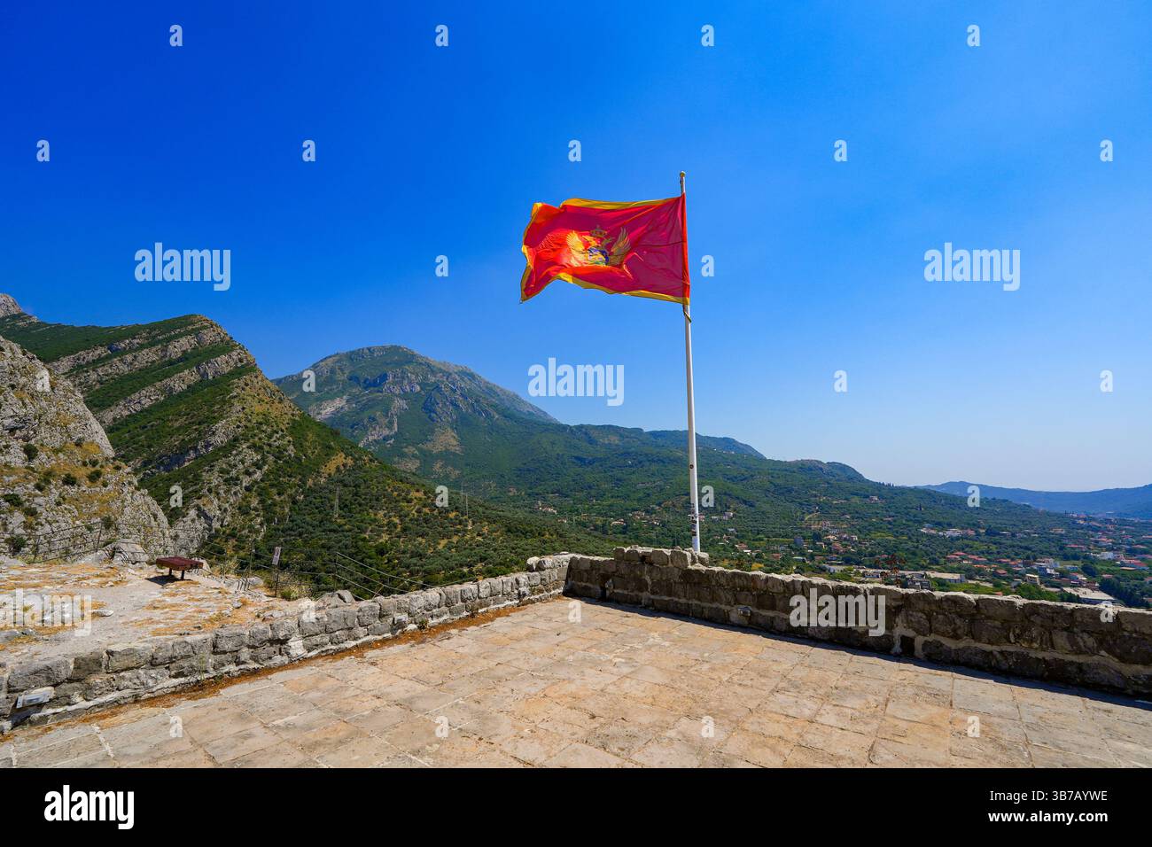 Montenegrin flag in Stari grad Bar (Old Town of Bar), the ruins of an ...