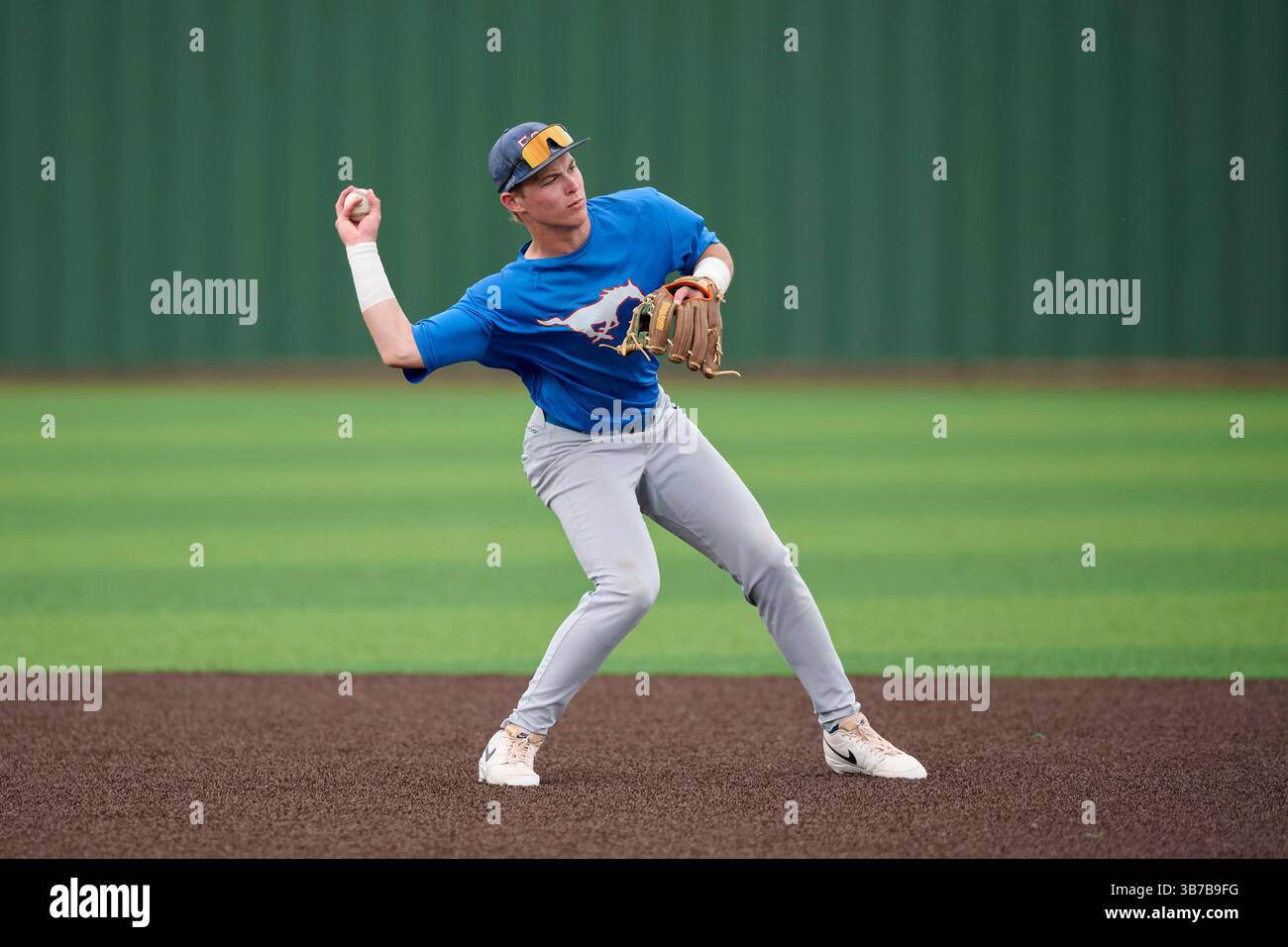 Fort Cobb-Broxton Mustangs shortstop Eli Willits (2) throws to second base during practice ...