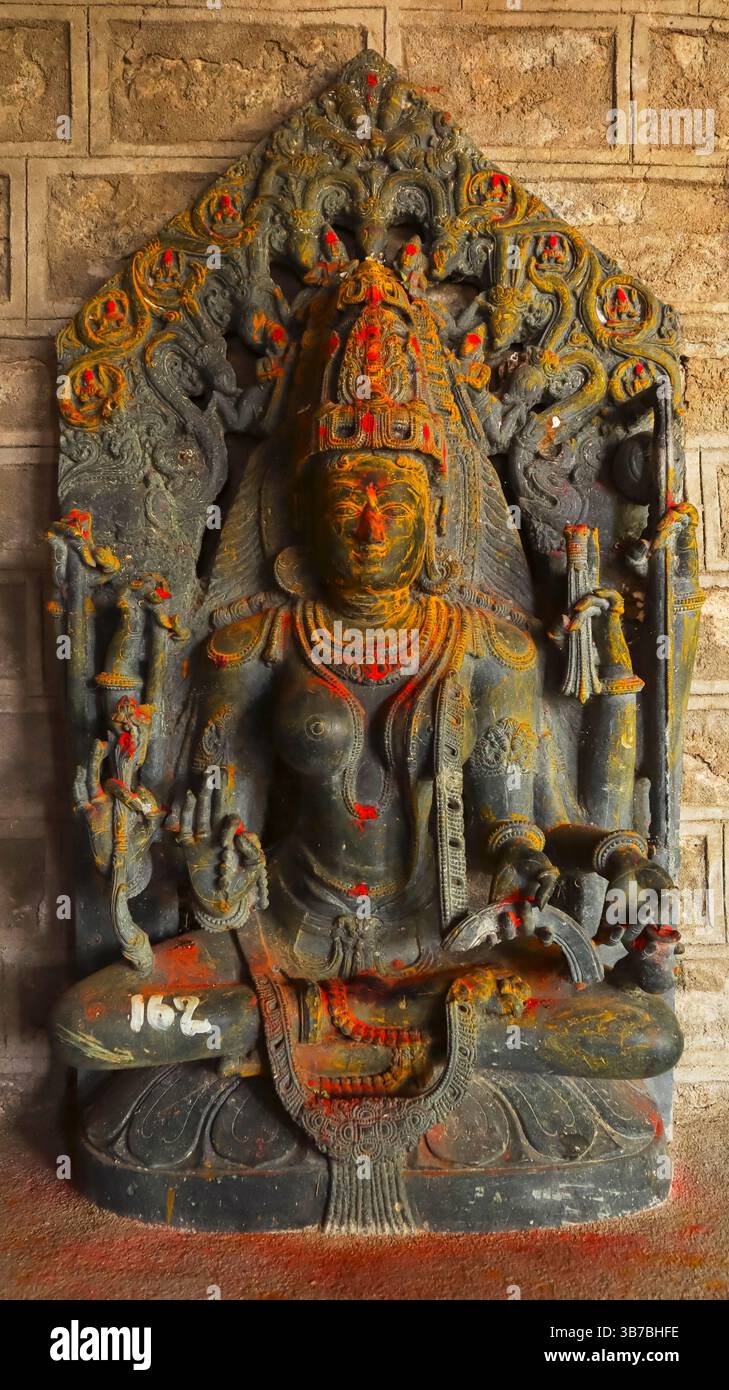 Carved sculpture of a Hindu goddess in the campus of Shri Someshwara ...