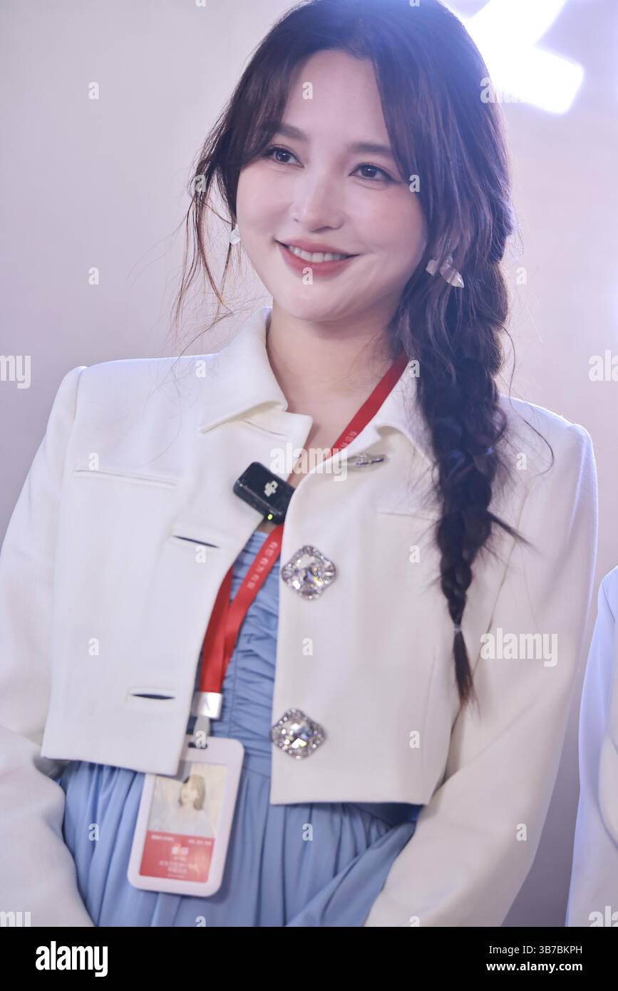 Chinese actress and singer Jin Sha attends an activity in Shanghai ...