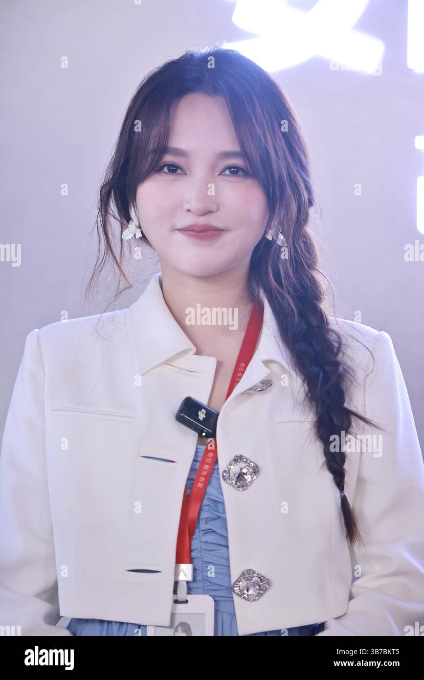 Chinese actress and singer Jin Sha attends an activity in Shanghai ...