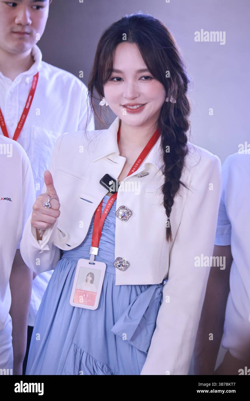 Chinese actress and singer Jin Sha attends an activity in Shanghai ...