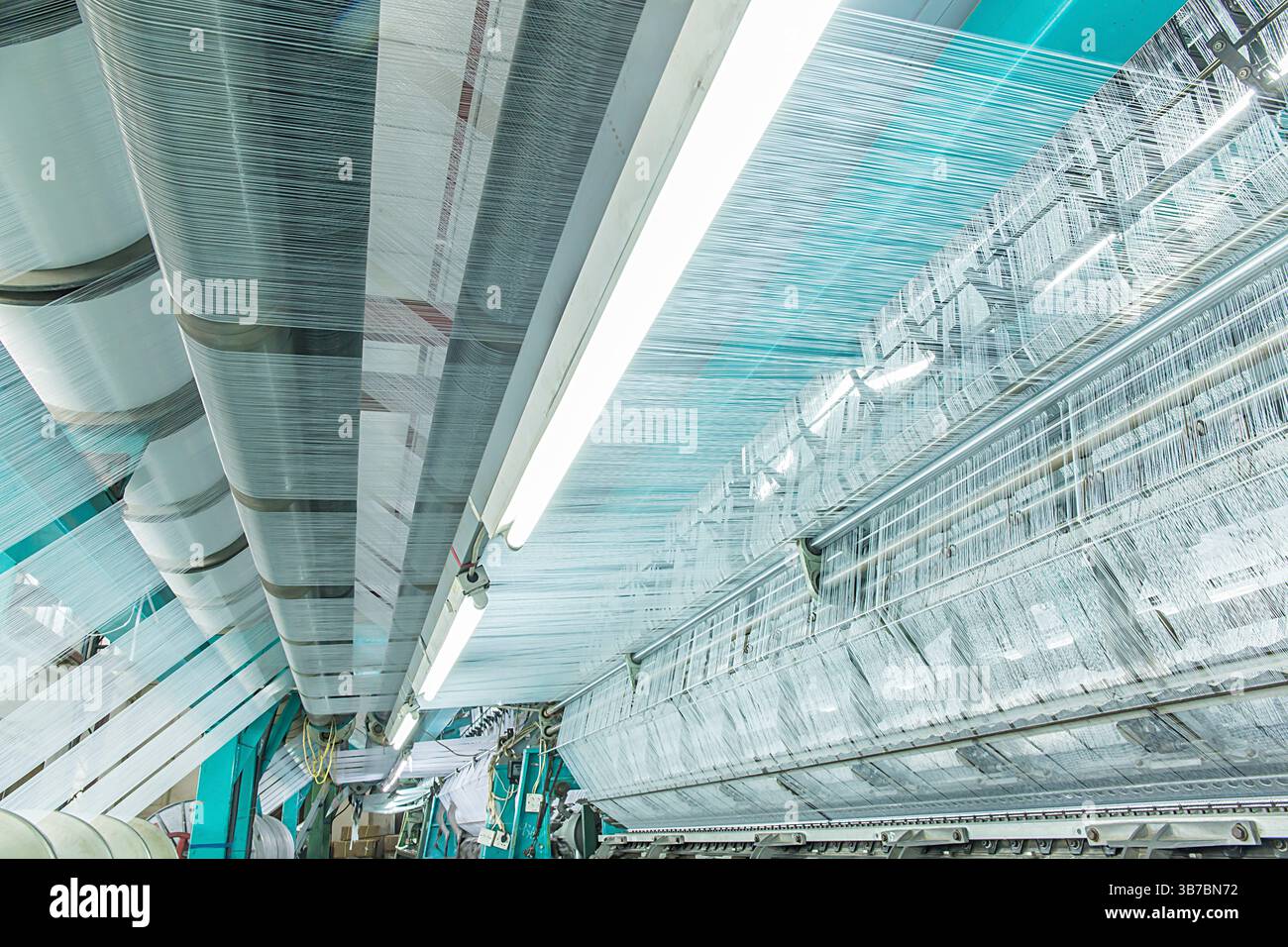 Close up industrial textile weaving hi-res stock photography and images ...