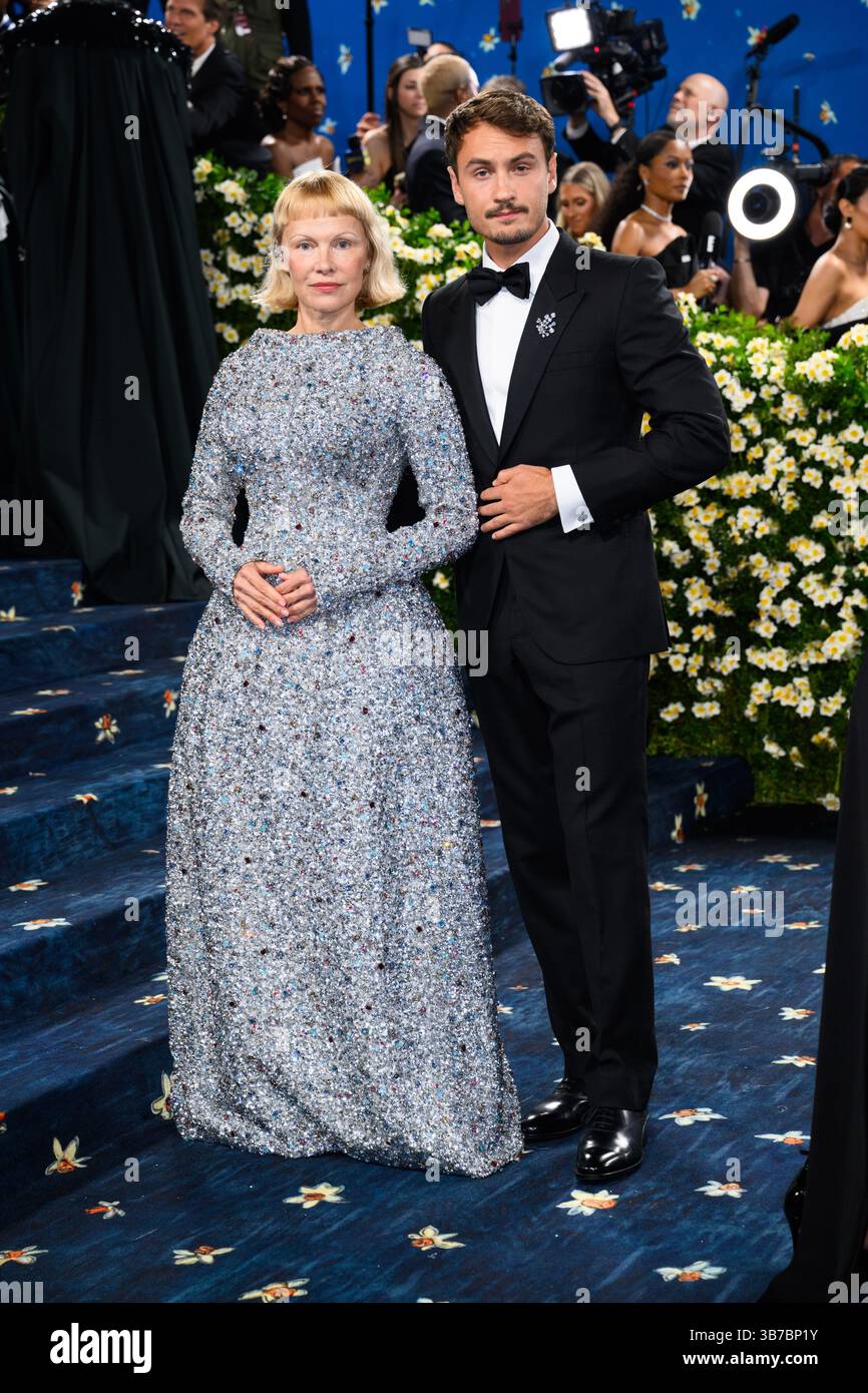 Pamela Anderson and Brandon Thomas Lee attending the Metropolitan ...