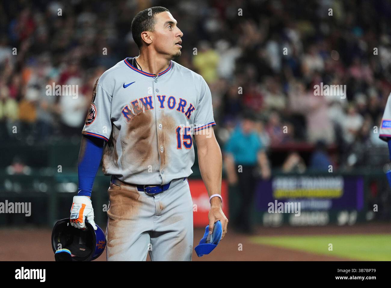 New York Mets' Tyrone Taylor walks back to the dugout after being ...