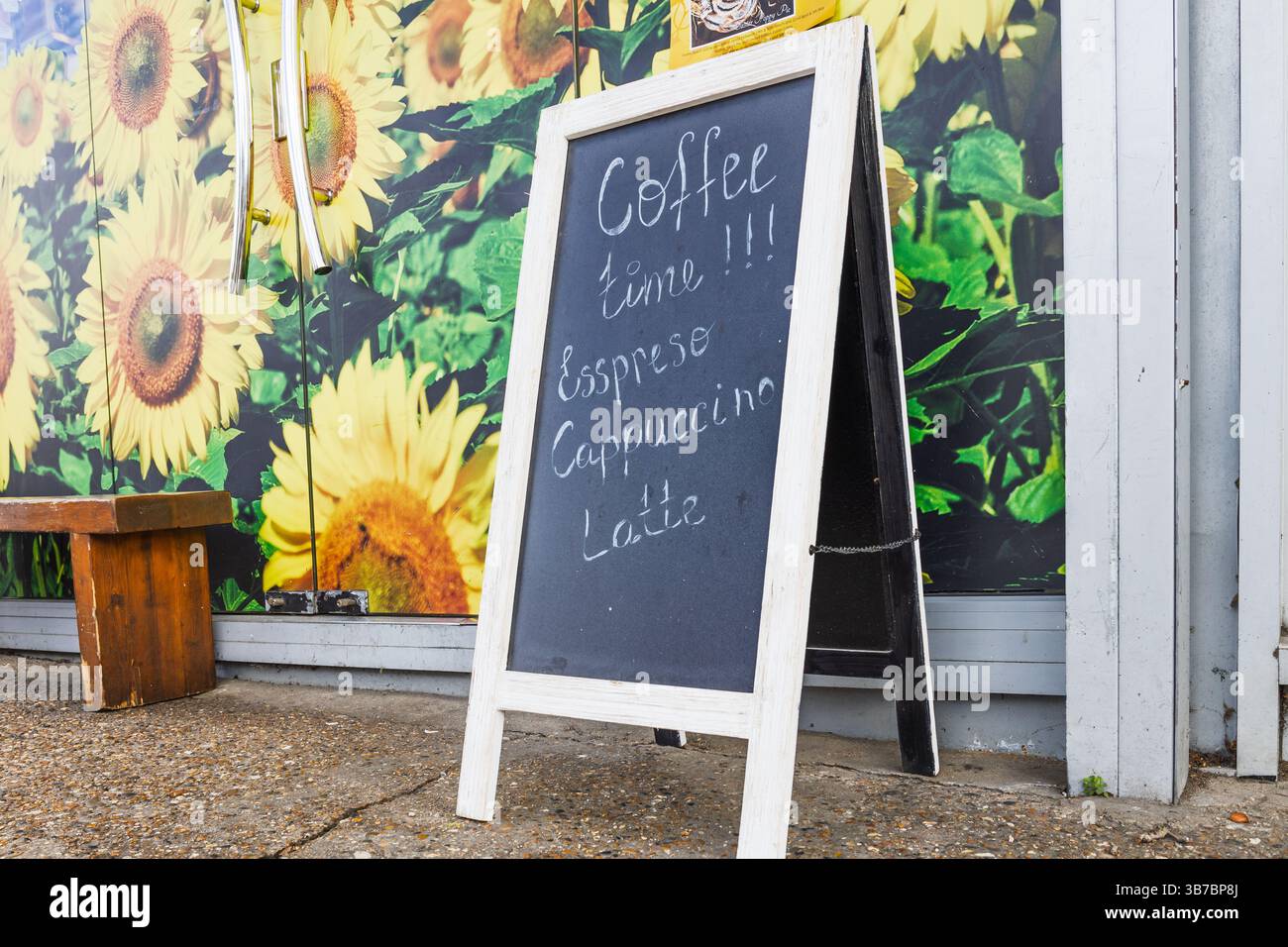 Coffee shop sidewalk chalkboard advertising fresh coffee and daily ...