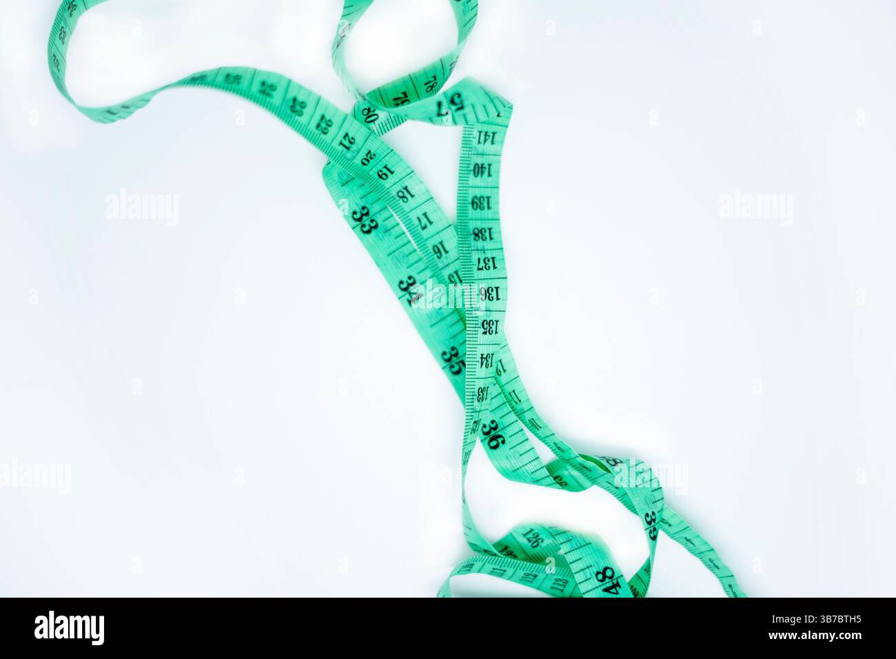 New green measuring tape hi-res stock photography and images - Alamy