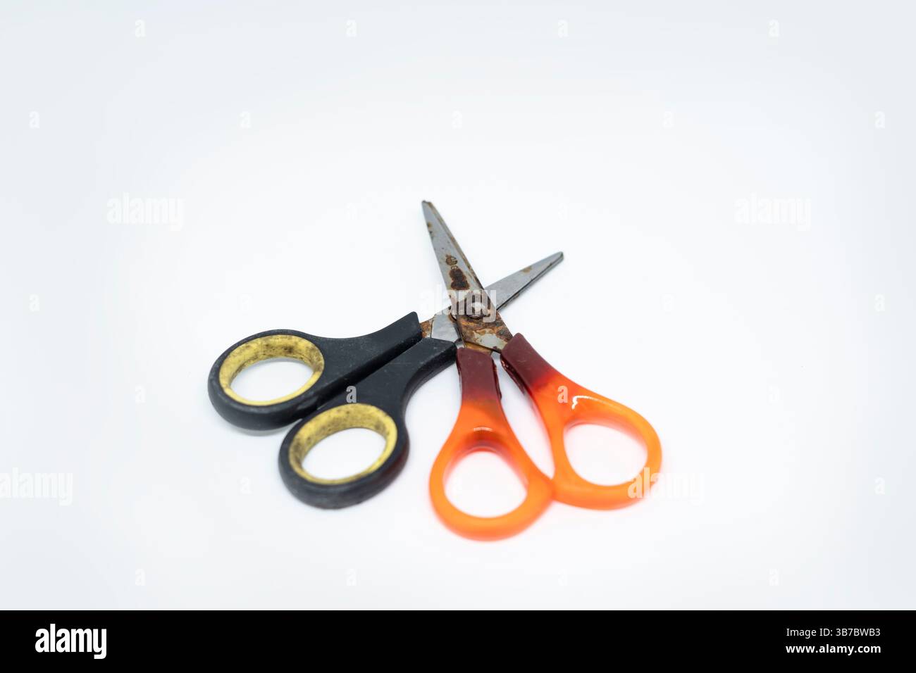 Rusty Broken Scissors isolated in white background Stock Photo - Alamy