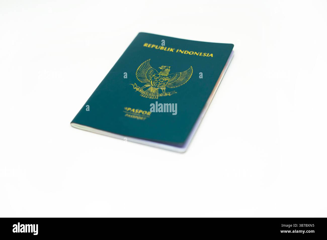 Indonesian electronic passport and regular passport isolated on white ...