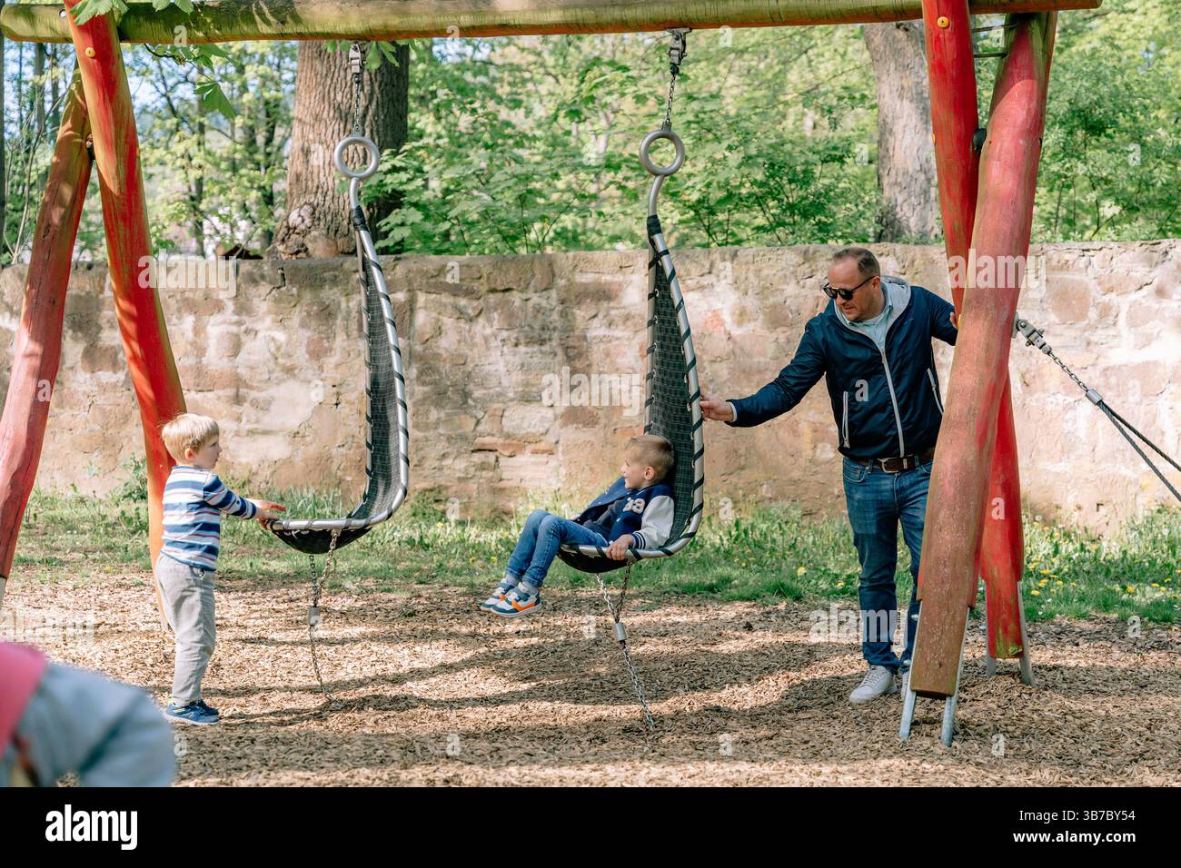 Child waiting turn play park hi-res stock photography and images - Alamy