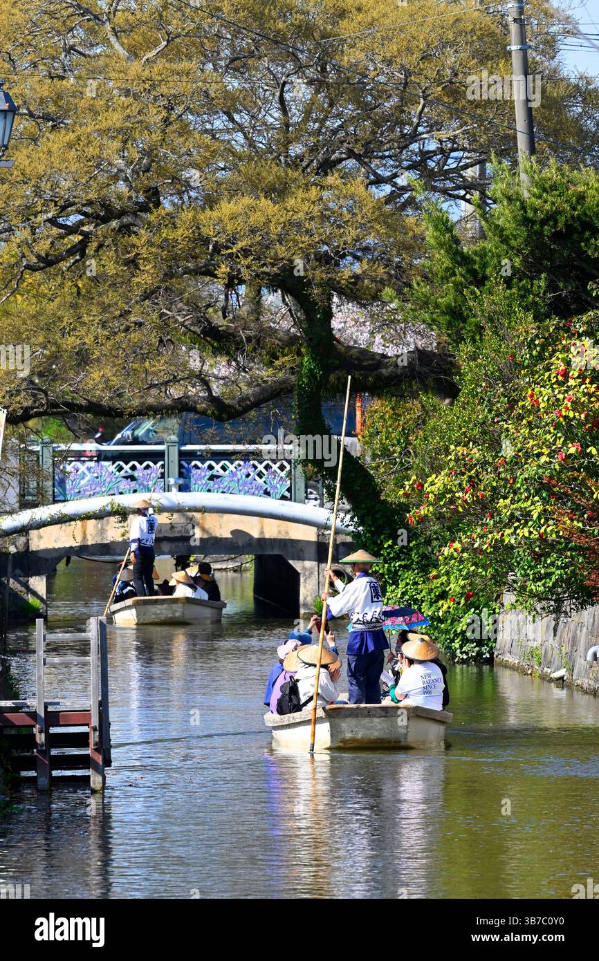 Boatman of Yanagawa, who punt traditional boats known as donko-bune ...