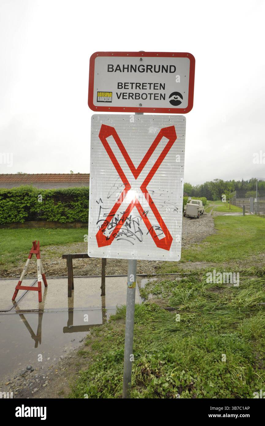 ungated railroad crossing with level crossing sign or St. Andrew s ...