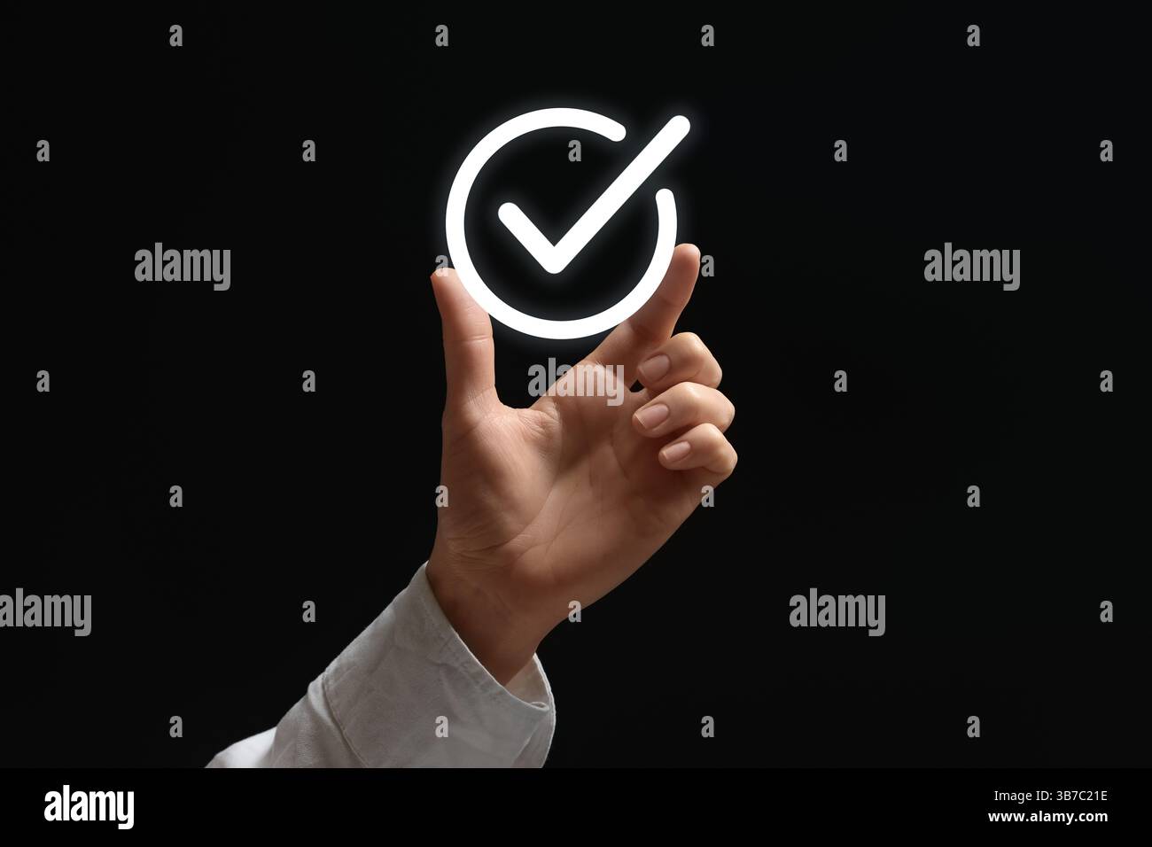 Approved. Woman holding virtual check mark in hand on black background ...
