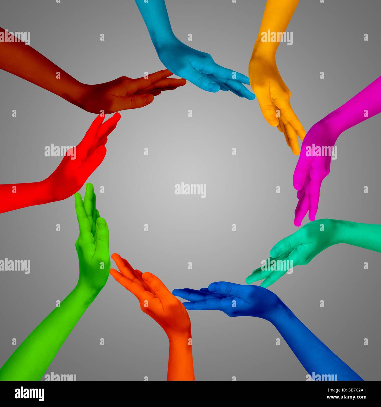 Making circle of human hands painted in different colors on grey ...