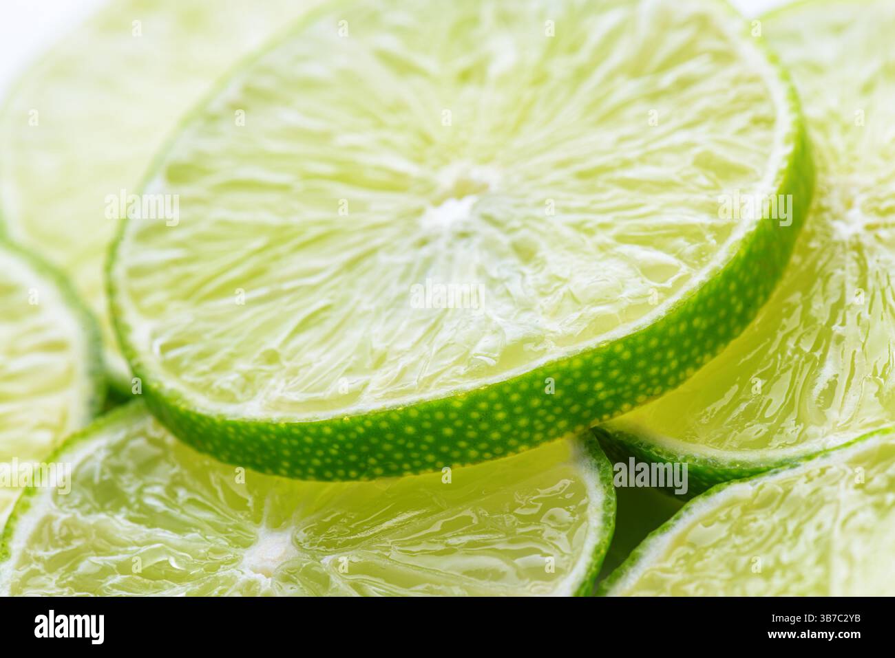 Closeup view of sliced fresh juicy lime Stock Photo - Alamy