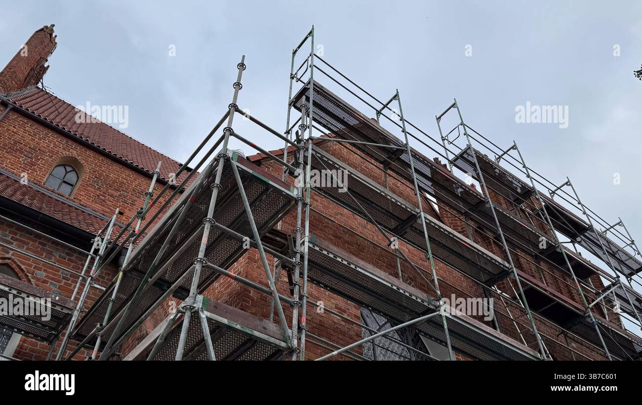 Scaffolding surrounds historic building hi-res stock photography and ...