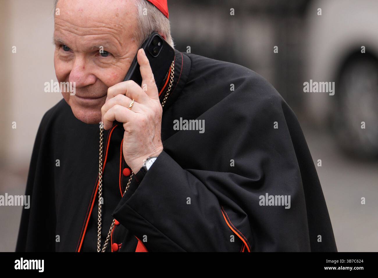 Rome, Italy. 27th Apr, 2025. Cardinal Christoph Schonborn is seen using ...