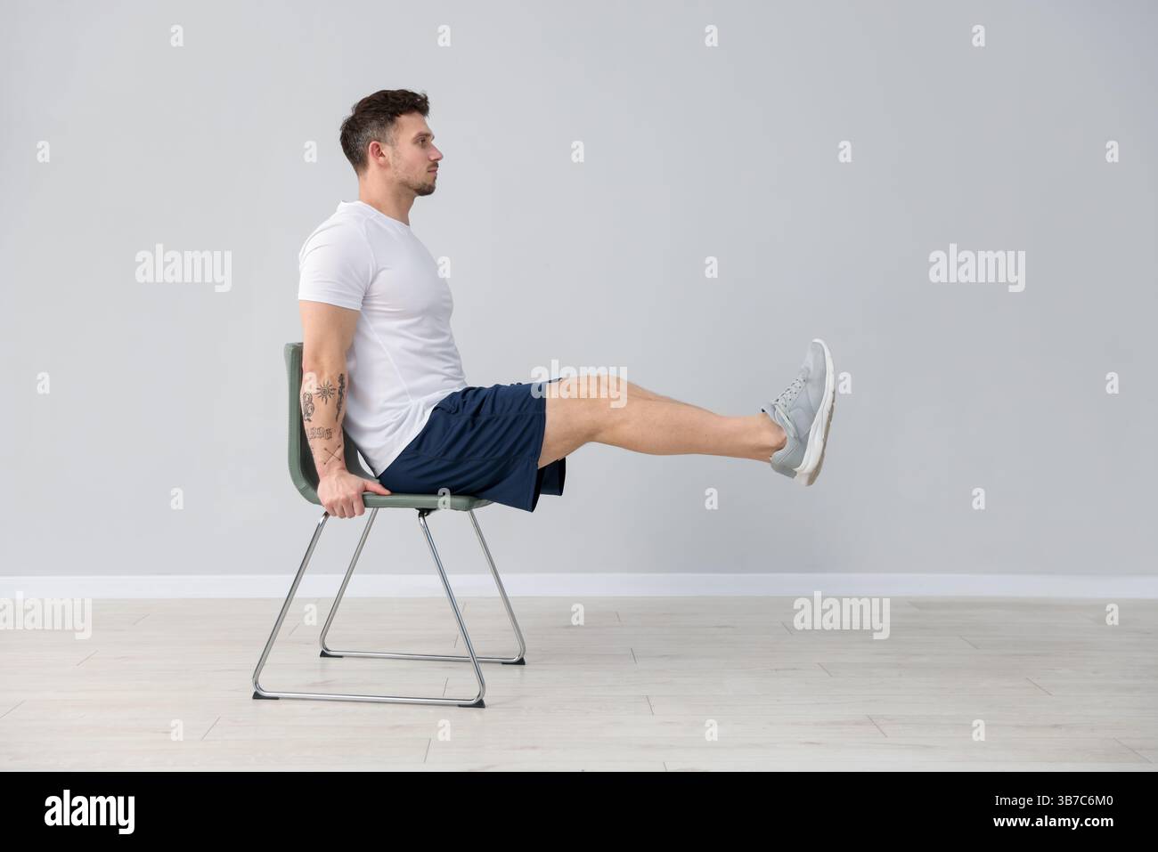 Man abs home chair hi-res stock photography and images - Alamy