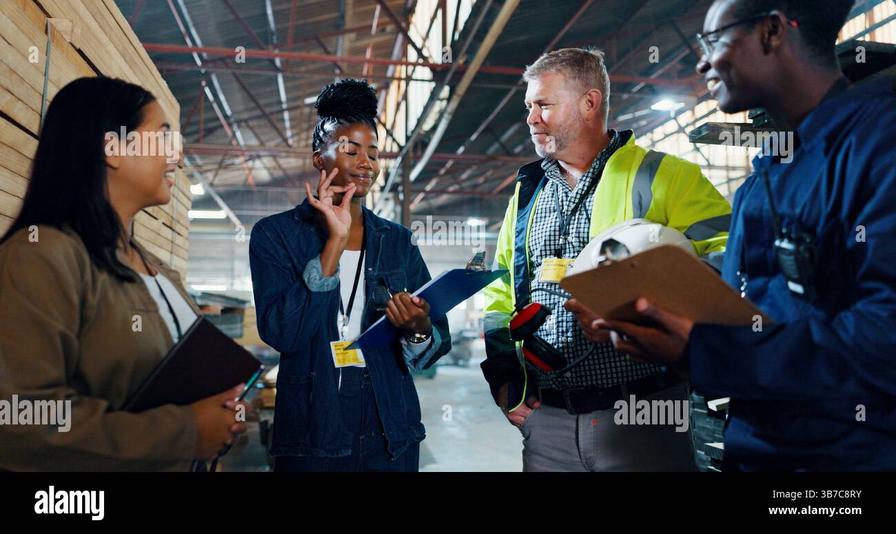 Team, clipboard and ok sign in factory for timber distribution approval ...