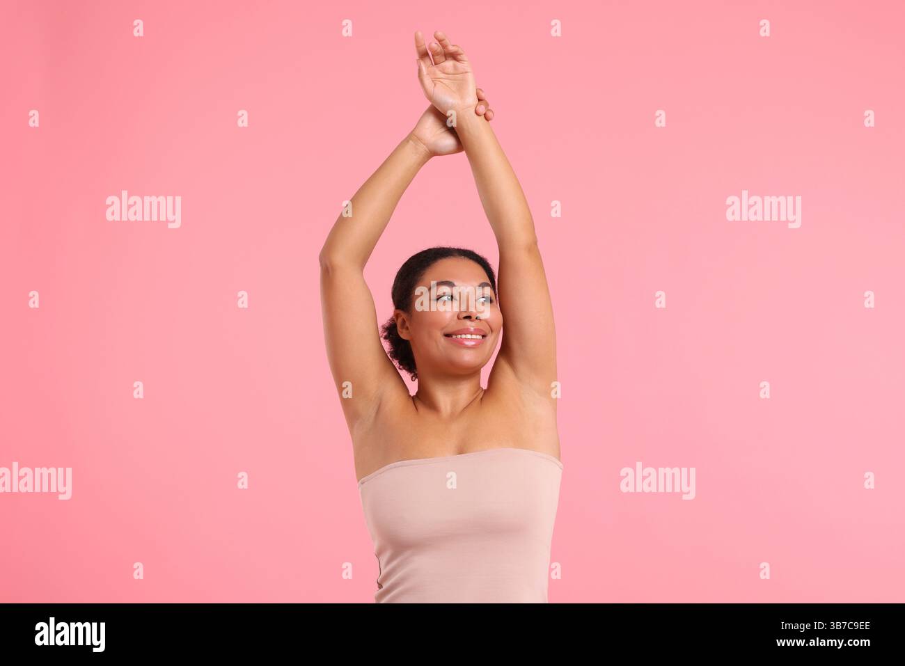 Woman showing hairless armpits hi-res stock photography and images - Alamy