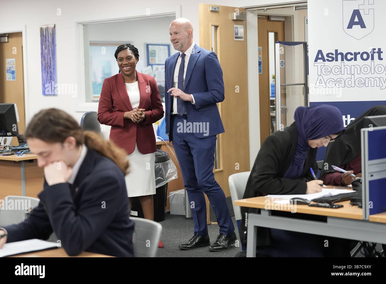 Conservative Party leader Kemi Badenoch speaks to headmaster Douglas ...