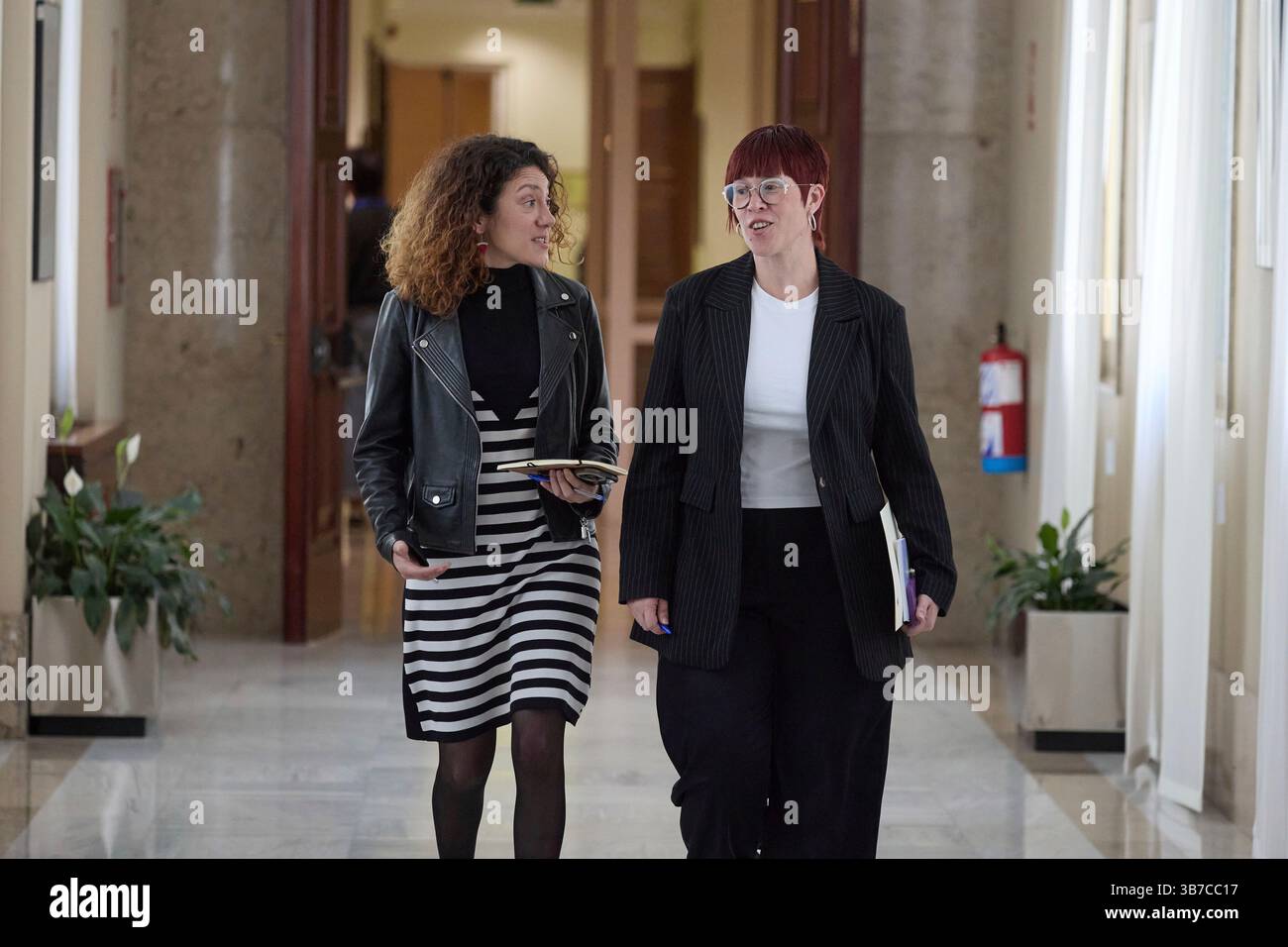 Sumar deputies Aina Calvo (l) and Águeda Micó (r), arrive at a meeting ...