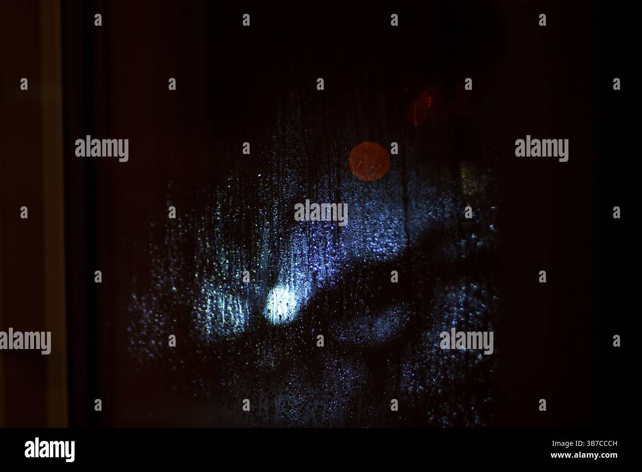 Urban nightscape rain soaked window hi-res stock photography and images ...