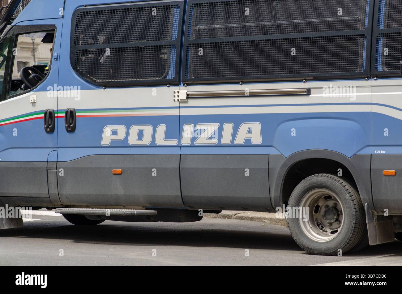 state police, a robust transport vehicle equipped with riot protection ...