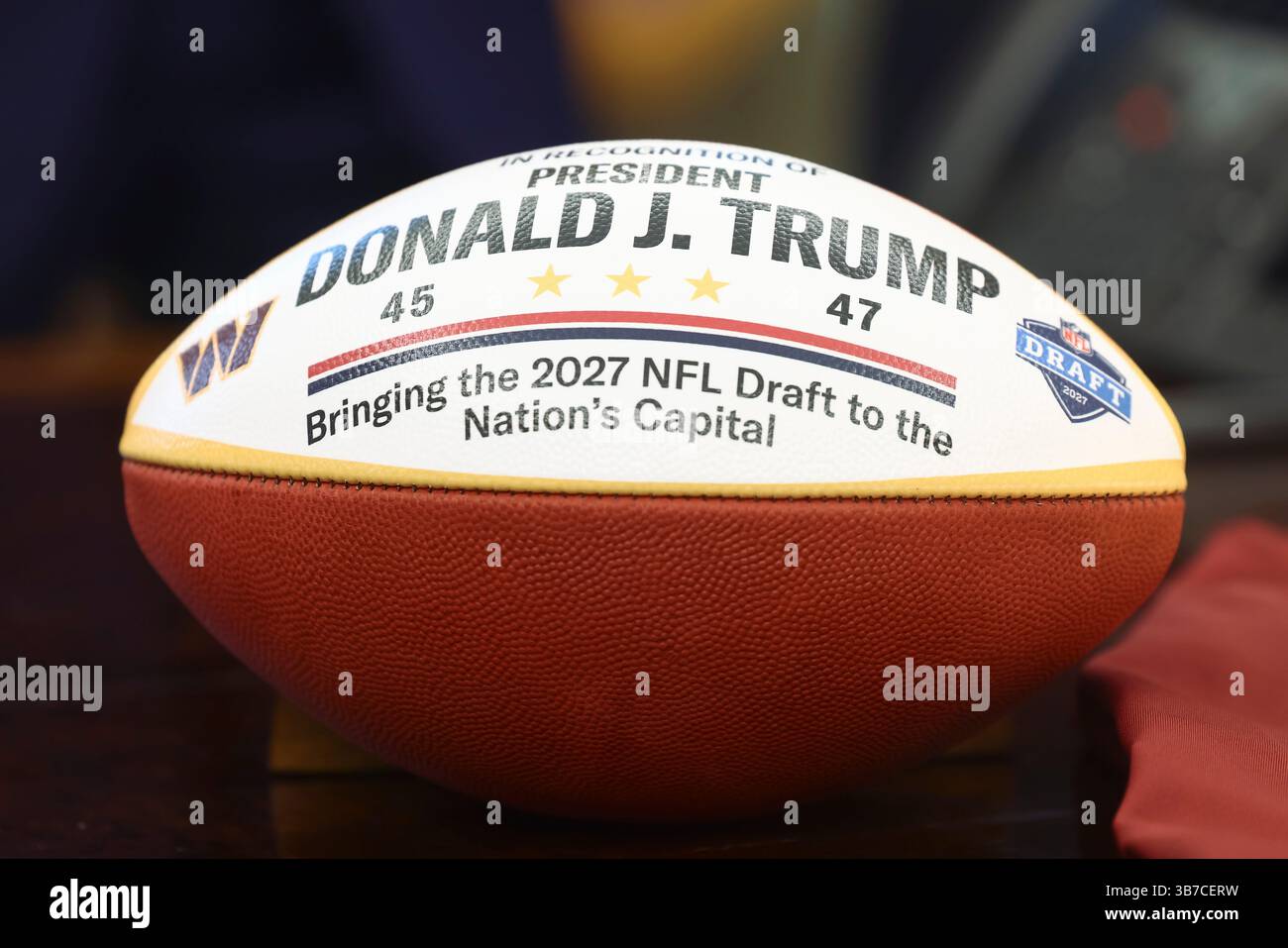 A football on display as US President Donald Trump announces plans for ...