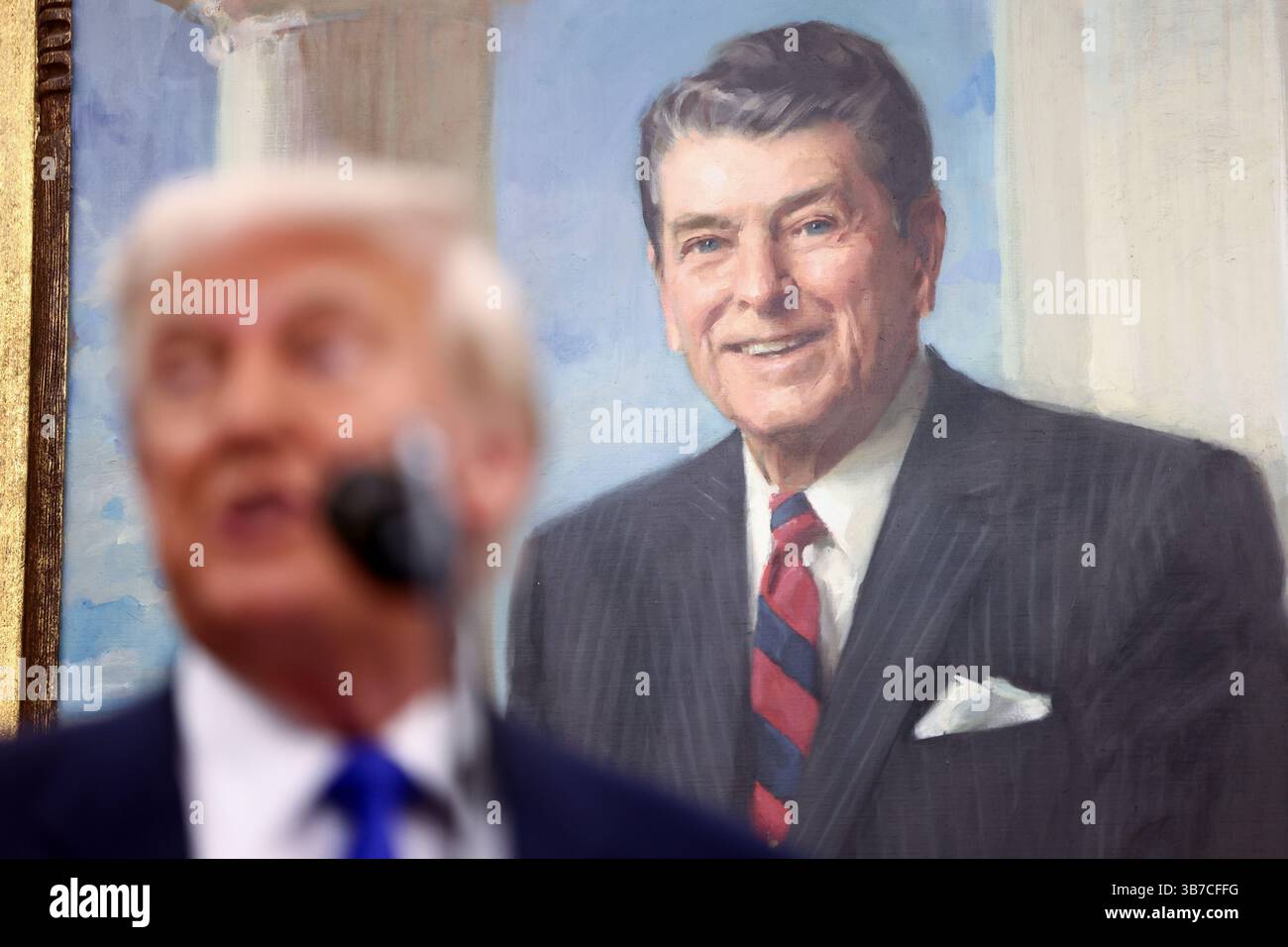 A portrait of former president Ronald Reagan behind United States ...