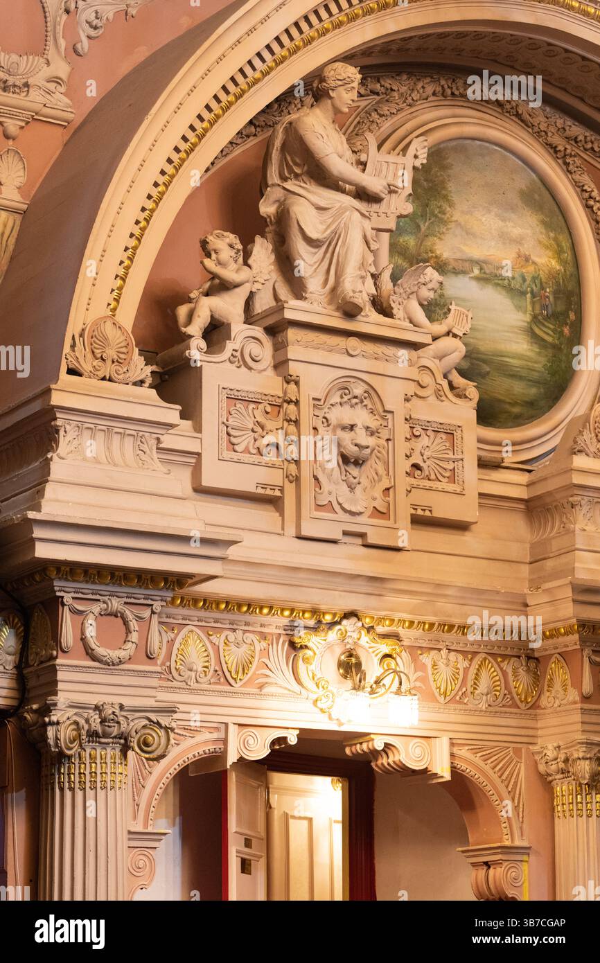 Ornate detail above a doorway in the Shaftesbury Theatre, London. The ...