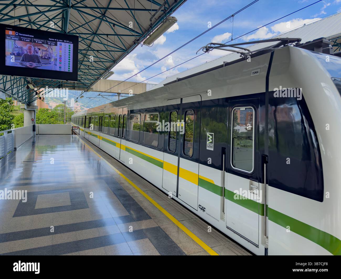 A modern light rail passenger train in the Suramericana Station on Line ...