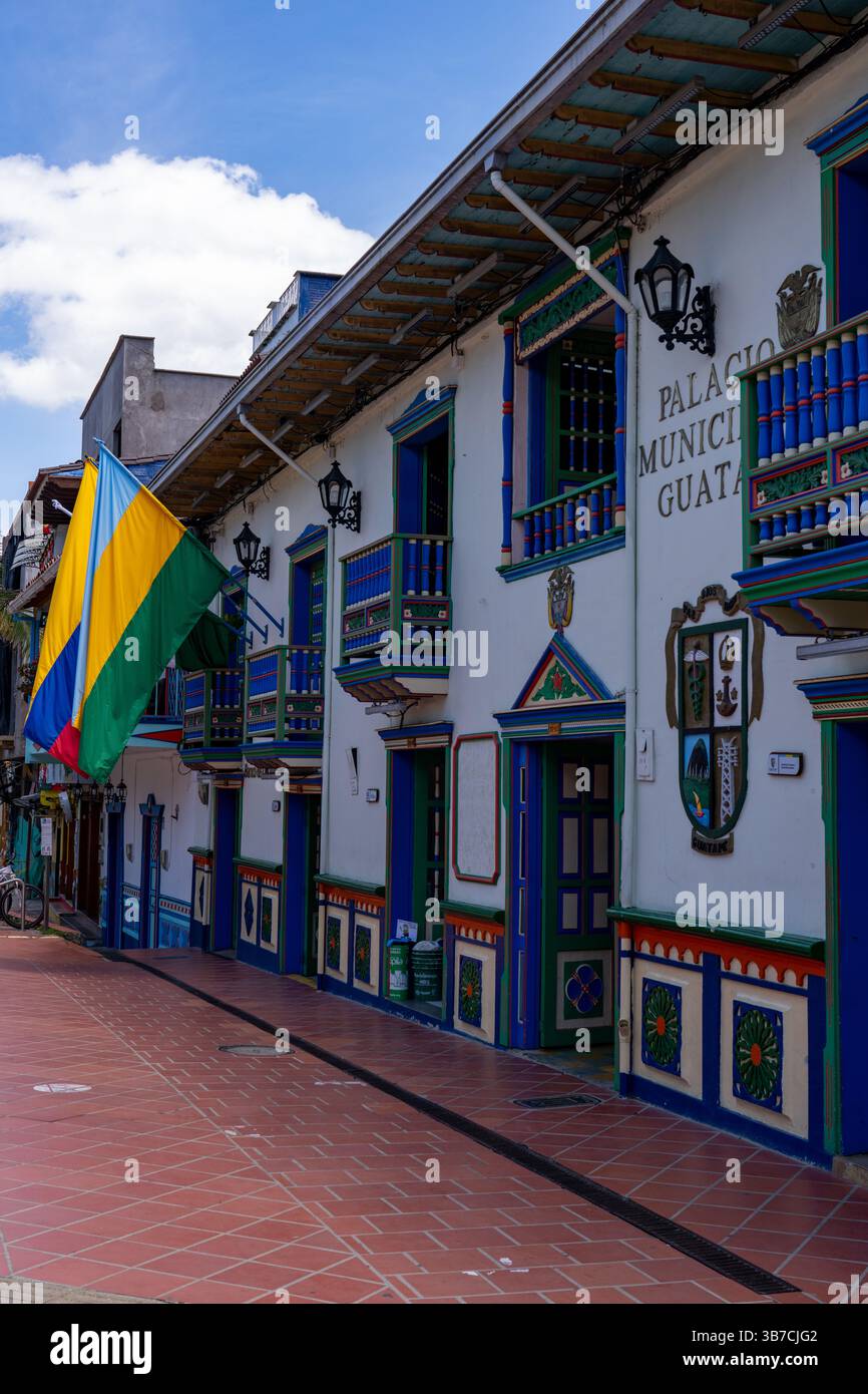 The colorfully-painted Municipal Palace with 3-D zócalo plaster wall ...