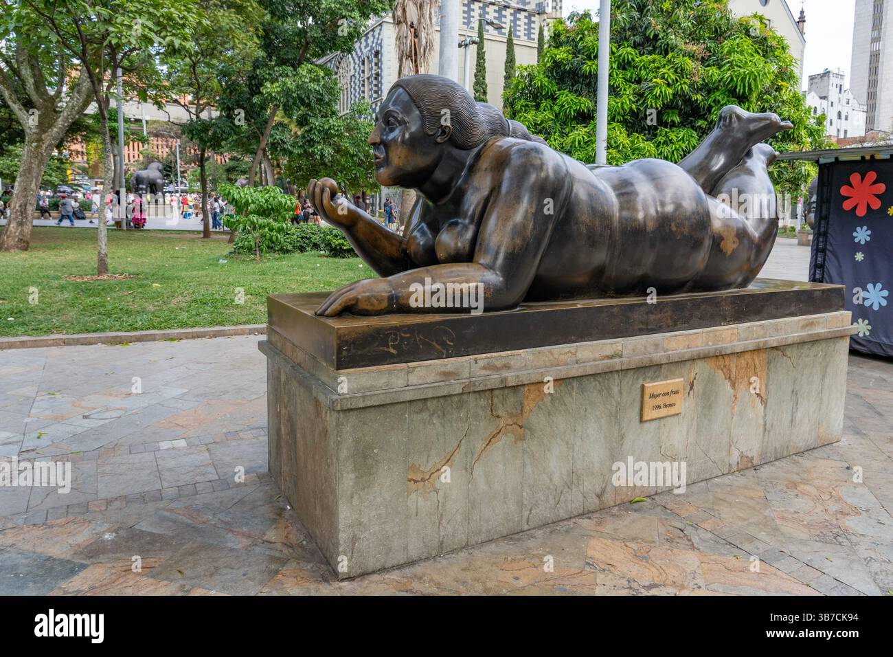 Woman with Fruit, a sculpture by Fernando Botero in the Botero Plaza in ...