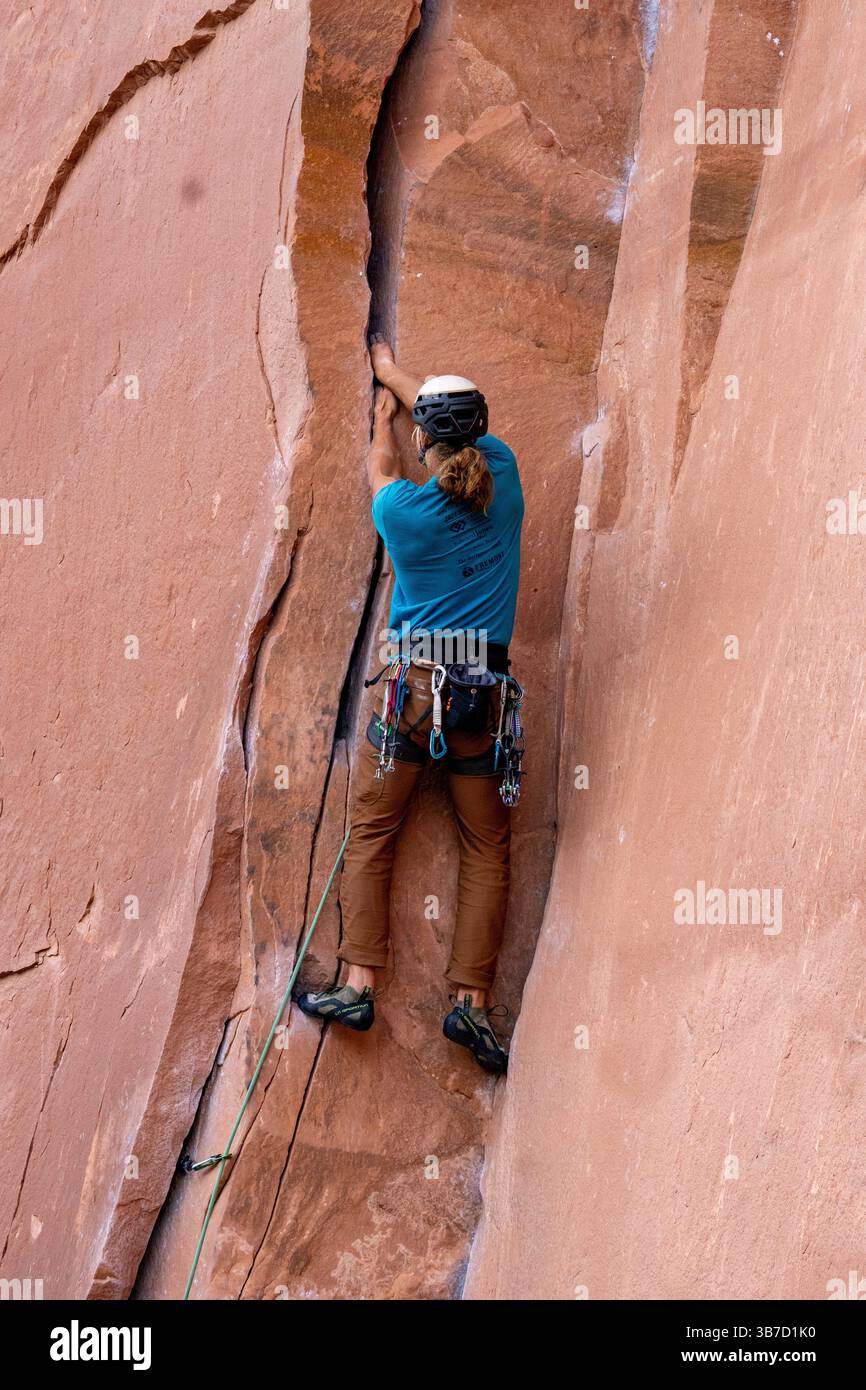 May 11, 2024, Moab, Utah, United States: A lead climber using the ...